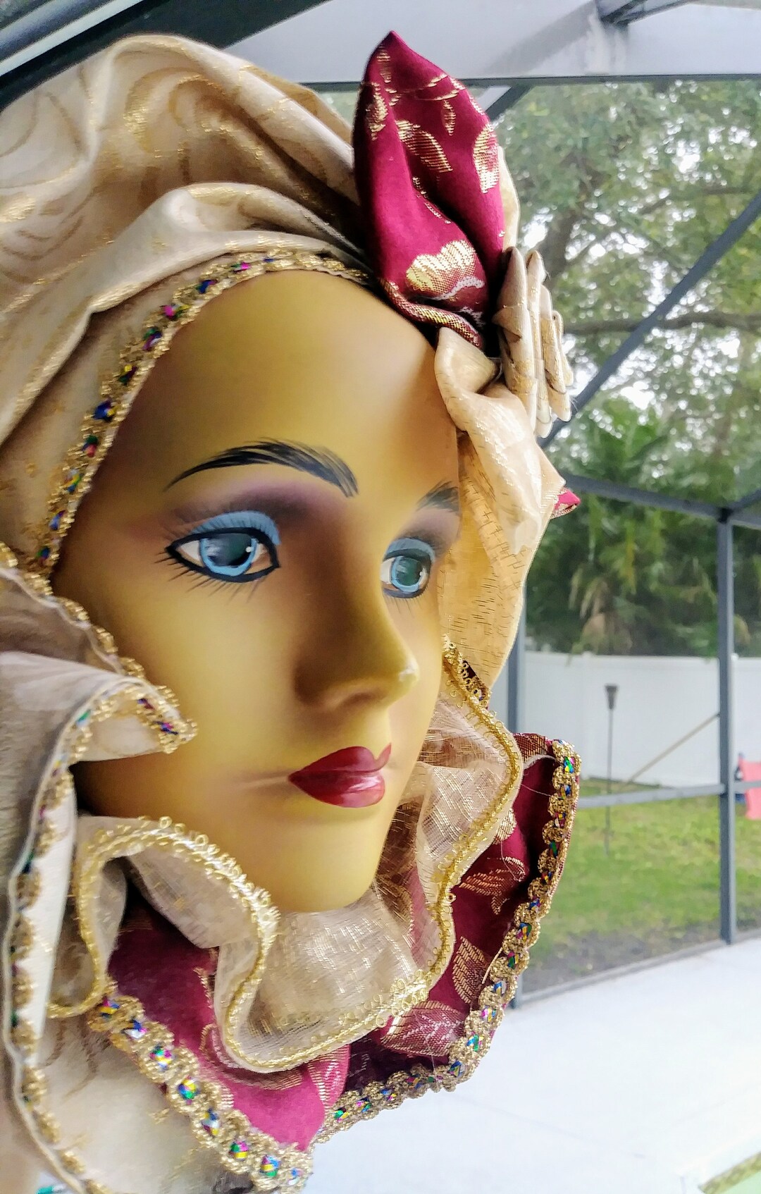 Lady Head Wall Art. Beautiful Fabric Headpiece Adorns Doll Like Lady ...