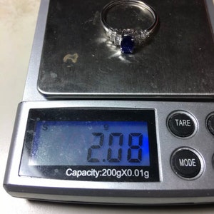 9ct. 375. White Gold. Diamond & Created Sapphire Ring. Size T. U.S ...