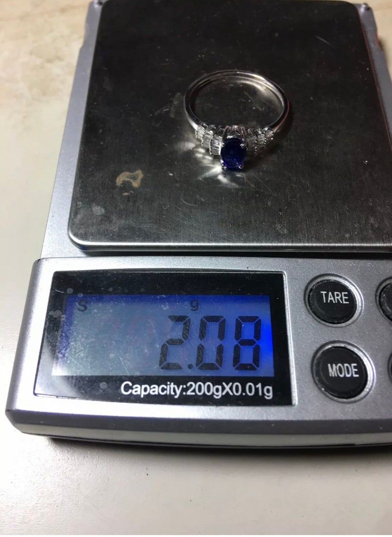 9ct. 375. White Gold. Diamond & Created Sapphire Ring. Size T. U.S ...