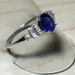 9ct. 375. White Gold. Diamond & Created Sapphire Ring. Size T. U.S ...