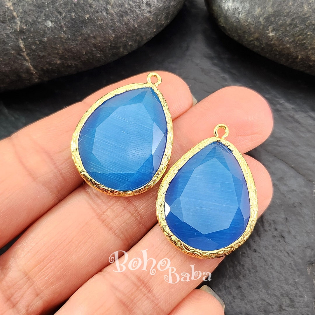 Topaz Blue Crystal Teardrop Cats Eye Charm With Gold Plated Hammered ...