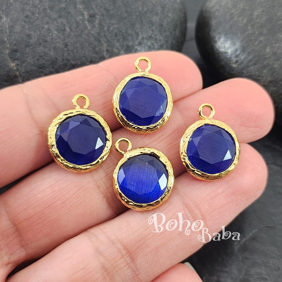 Sapphire Blue Round Crystal Cats Eye Charm With Gold Plated Hammered ...