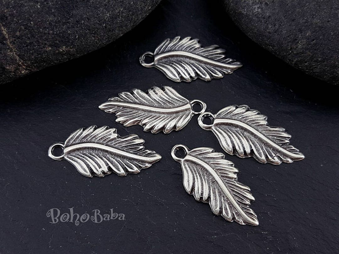 Colgantes de plumas de plata, amuletos de plumas, amuletos de plata ...