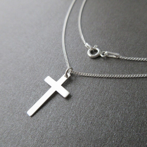 Black Thin Long Cross Symbol