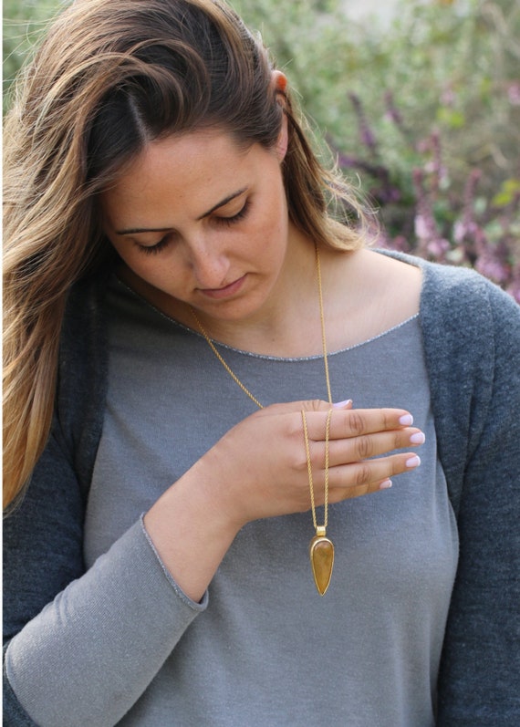 Long gold statement necklace store