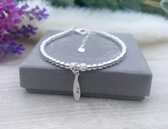 Angel feather bracelet store
