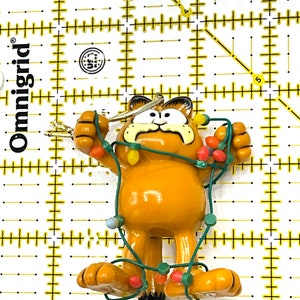 Gorgeous Collectible and Vintage Ornament as Garfield Holding Lights ...