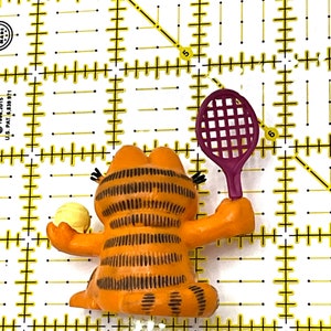 Gorgeous Collectible and Vintage Garfield is Playing Tennis. Tennis is ...