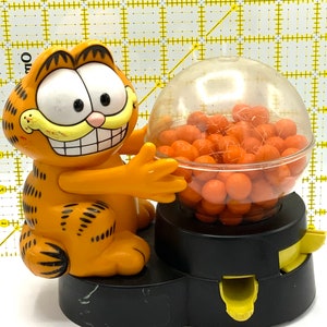 Gorgeous Collectible and Vintage Garfield Candy Dispenser, Toy, Cat ...