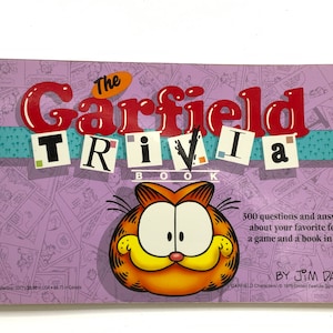 Gorgeous Collectible and Vintage Garfield Trivia Book and Throw His ...