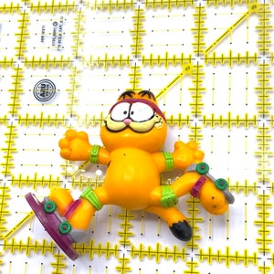 Vintage Garfield Rolling Skates Figurine, Cat, Orange. - Etsy