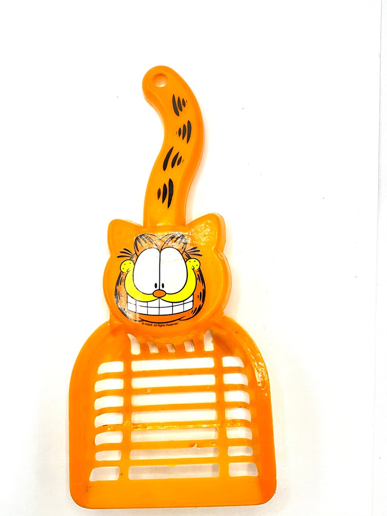 Gorgeous Collectible and Vintage Garfield Poop Scoop Cat Litter, Orange ...