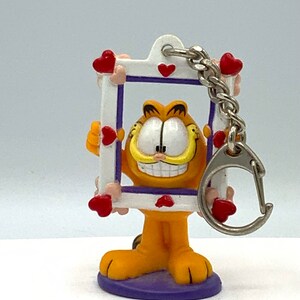 Gorgeous Collectible and Vintage Garfield Keychain With Pictures Frame ...