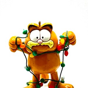 Gorgeous Collectible and Vintage Ornament as Garfield Holding Lights ...