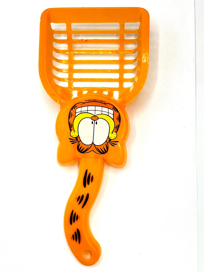 Gorgeous Collectible and Vintage Garfield Poop Scoop Cat Litter, Orange ...