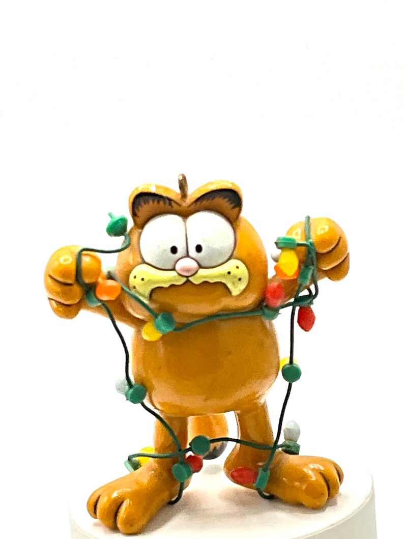 Gorgeous Collectible and Vintage Ornament as Garfield Holding Lights ...