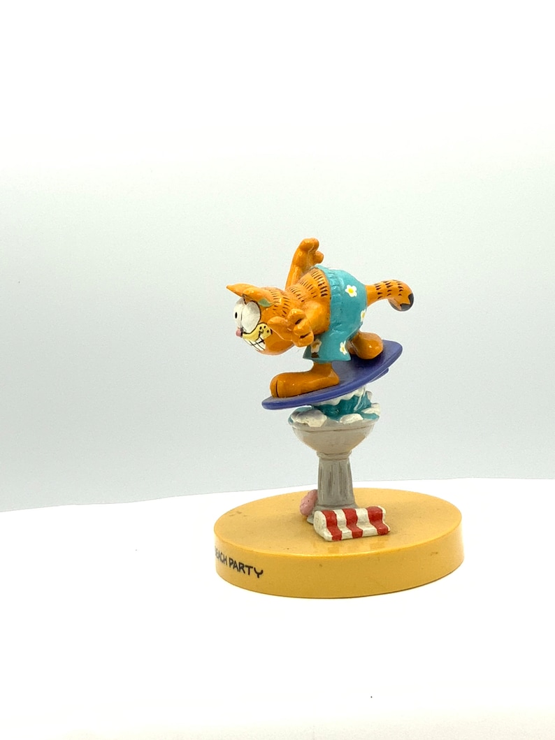 Gorgeous Collectible and Vintage Garfield Surfing, Figurine, Cat ...