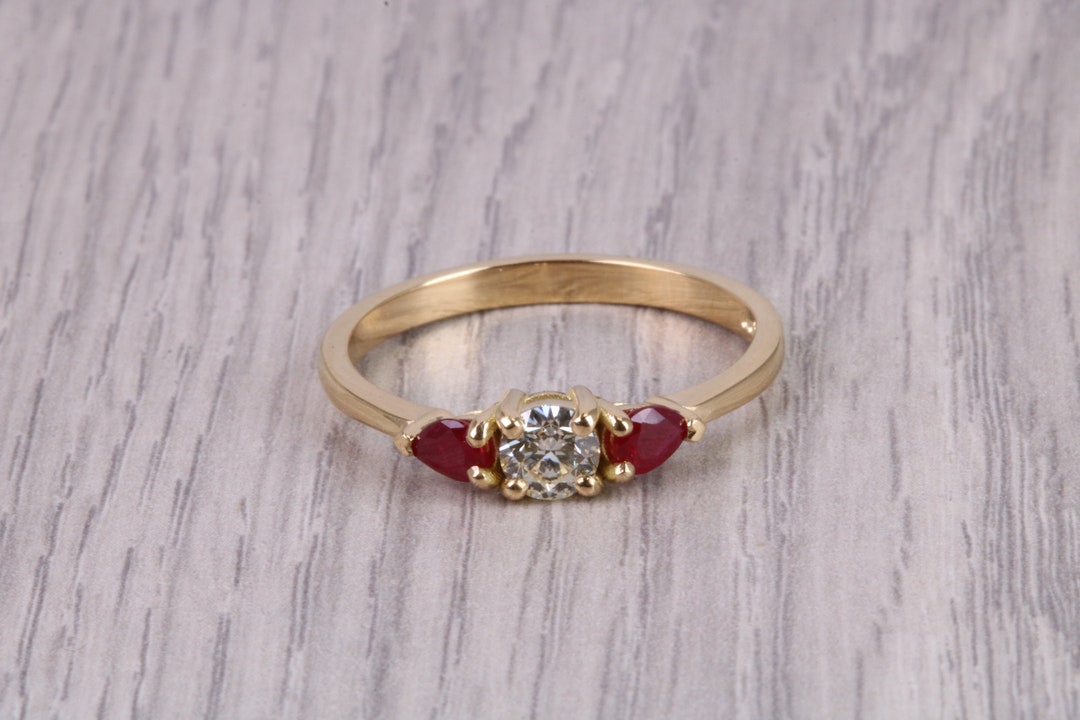 Round Diamond and Teardrop Cut Ruby Trilogy Ring, Made From 18ct Yellow ...