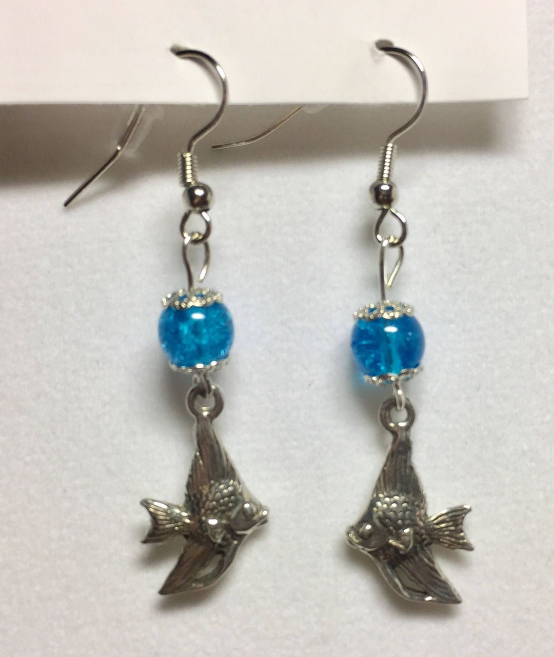 Nothing Fishy! Silver Plated Dangle Fish Earrings With Blue Glass Stone ...