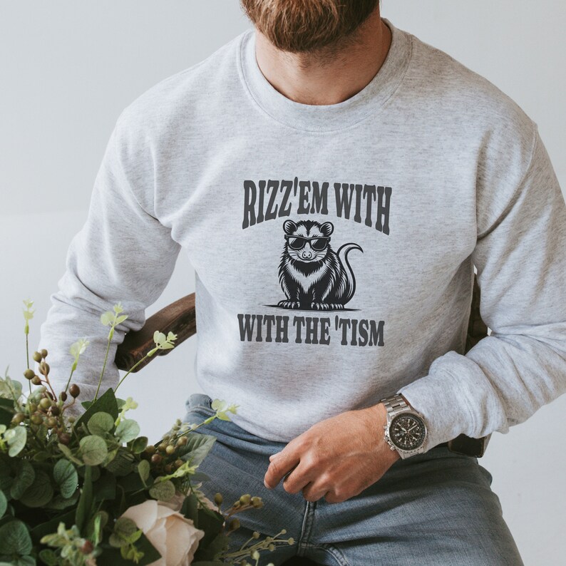 Rizz Em With the Tism Racoon Sweatshirt Celebrate Minds All Kinds ...