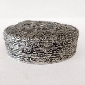Round Metal Trinket Box With Embossed Oriental Design Circa 1960 Round ...