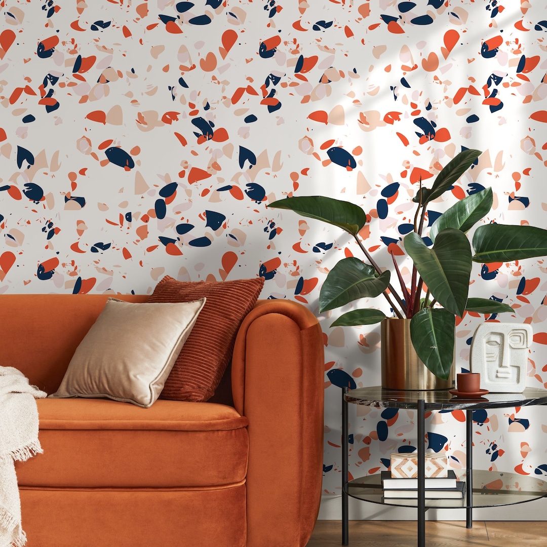 Papel pintado Terrazzo en naranja, azul y rosa sobre fondo blanco ...