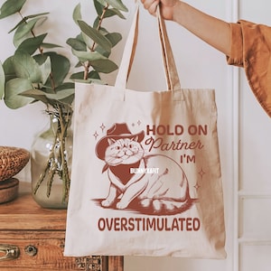 Hold on Partner Im Overstimulated SVG PNG, Cowboy Cat Shirt Design ...