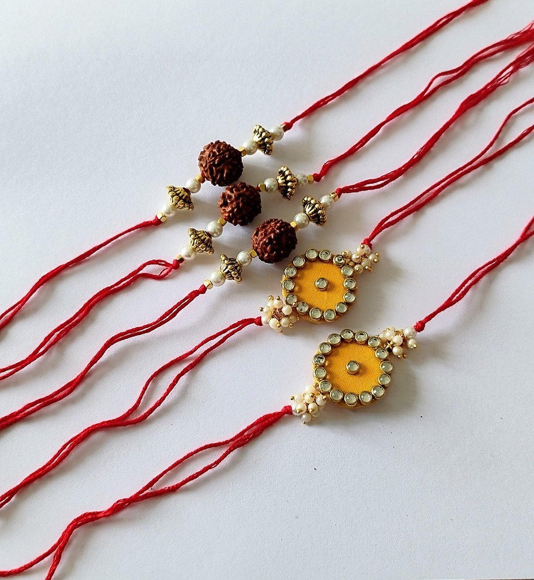 Buy Rakhi Combo 5 Rakhi Combo Rudraksha and Fabric Rakhi Combo Online ...
