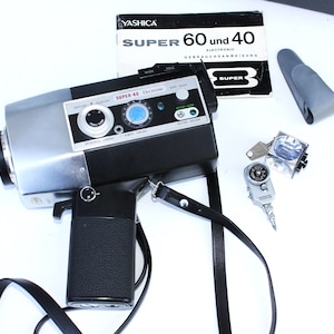Working Yashica SU 40 E 8mm Movie Camera With Case Ad Accessories ...
