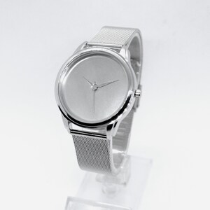 Glossy Minimalist Quartz Watches With Silver Shiny Dial Without Digits ...