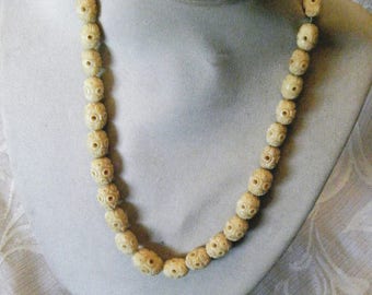Carved bone necklace | Etsy