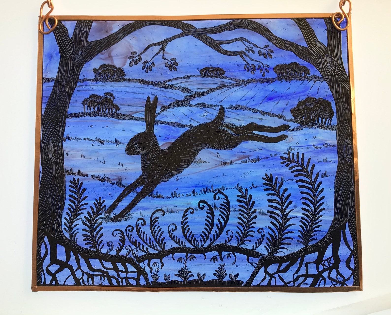 Leaping Hare in Evening Light hand painted and etched stained | Etsy
