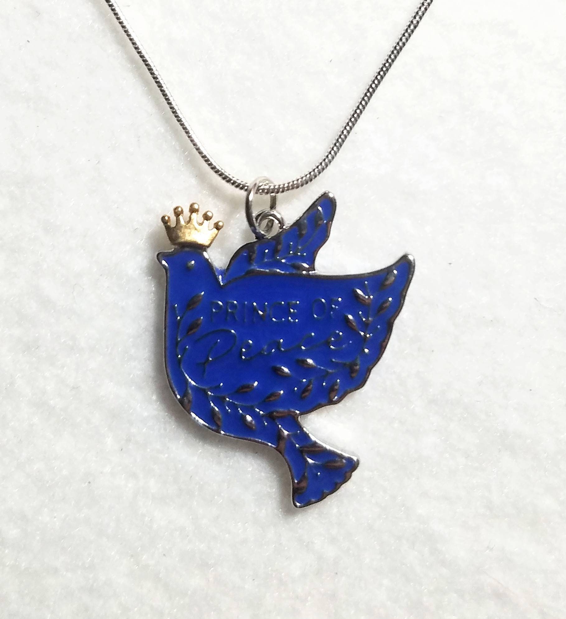 Pendentif Prince of Peace Colombe de Noël bleu foncé avec couronne dor ...