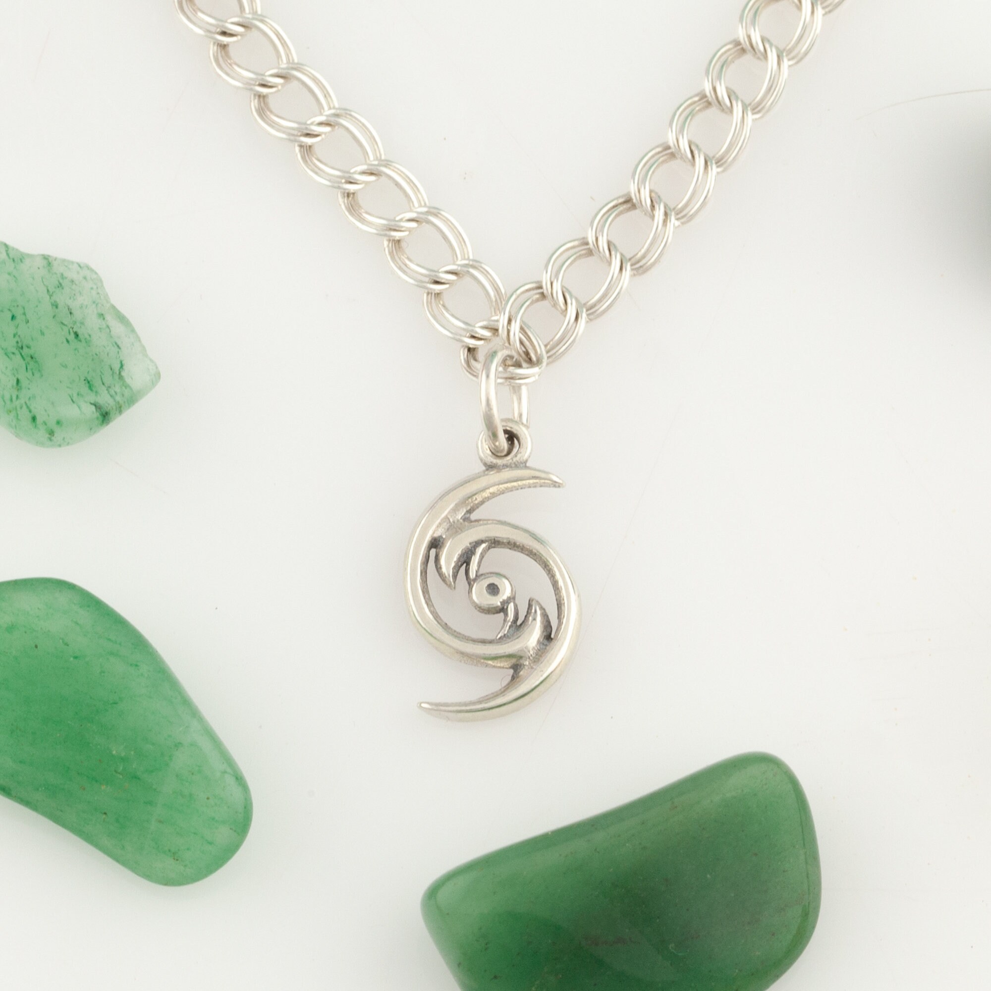 Hurricane Charm - Sterling Silver - Ocean Hurricane Charm on Coral ...