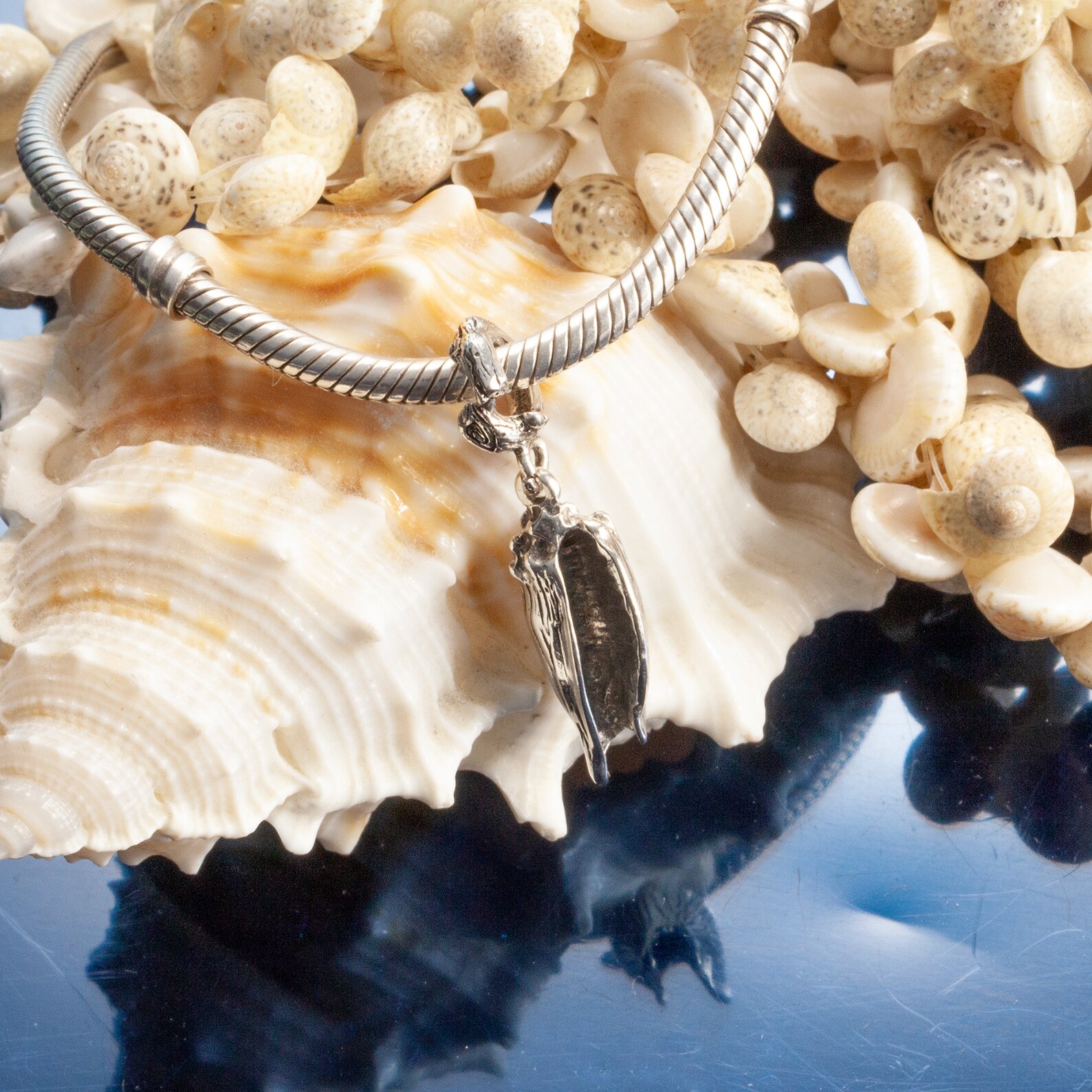 Conch Shell Charm - Sterling Silver - Beach Conch Shell Charm on Coral ...