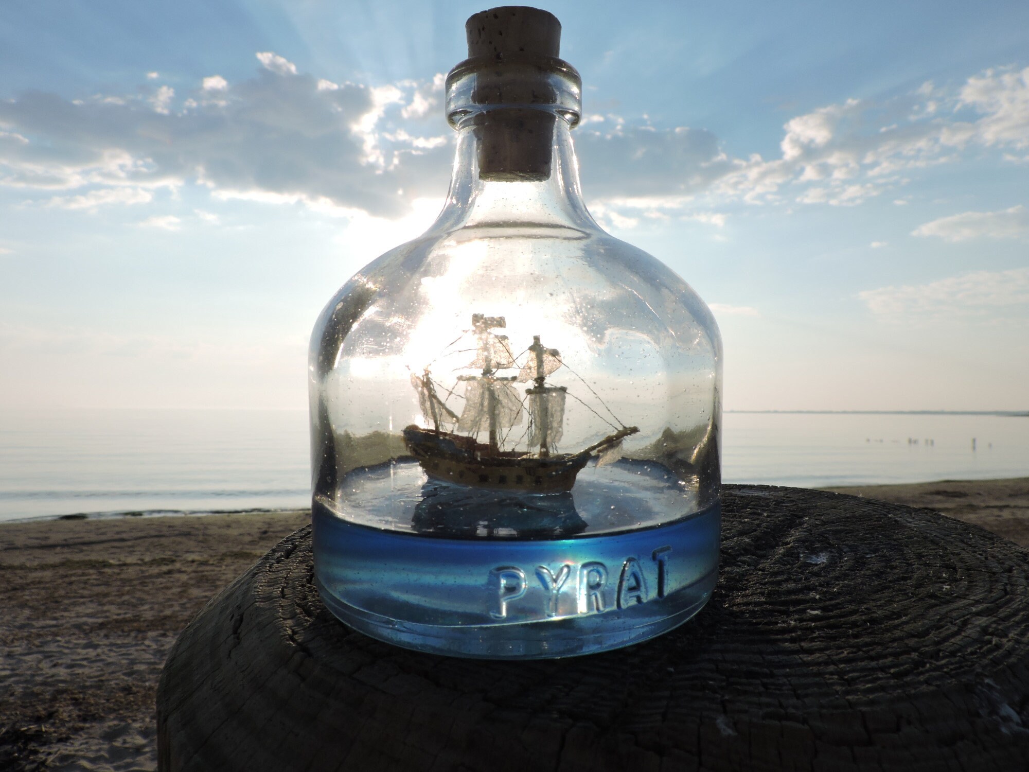 Pirate ship Ship in a bottle sailing on a blue sea | Etsy