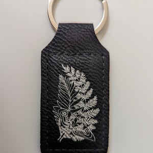 TLOU Ellie's Tattoo Keychain, Laser Engraved on Black or Grey ...