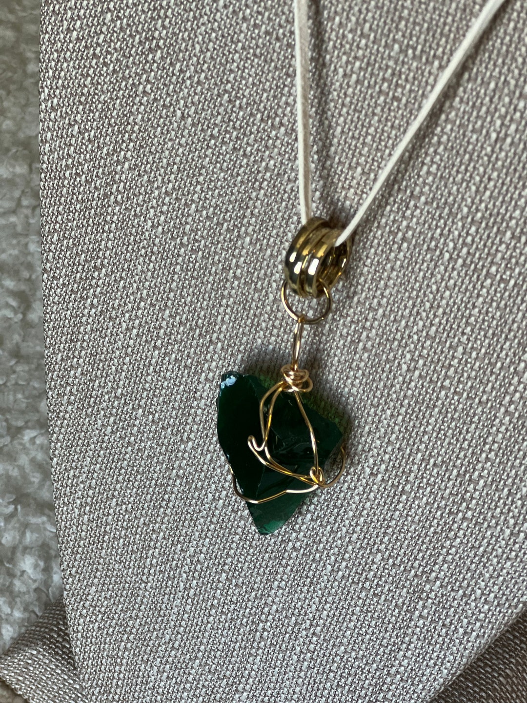 Merlin Green Andara Pendant With a White Deerskin Necklace. - Etsy