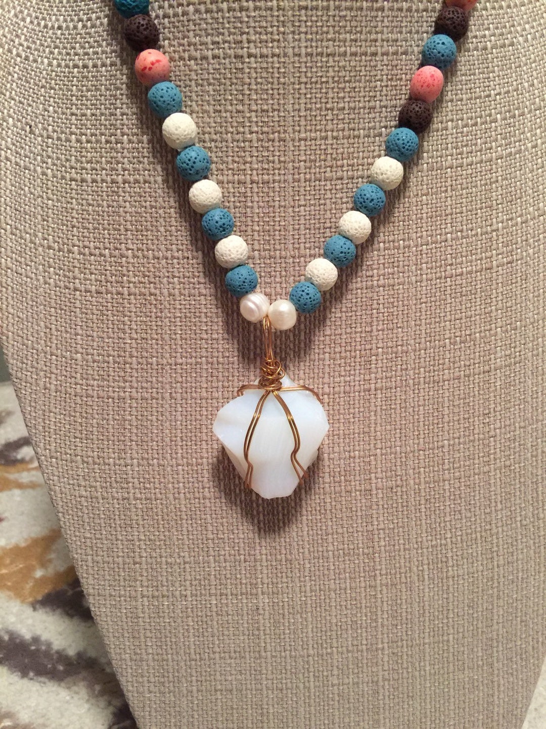 Luminescent White Andara With a 20 Inch Multi Colored Beaded Lava Stone ...