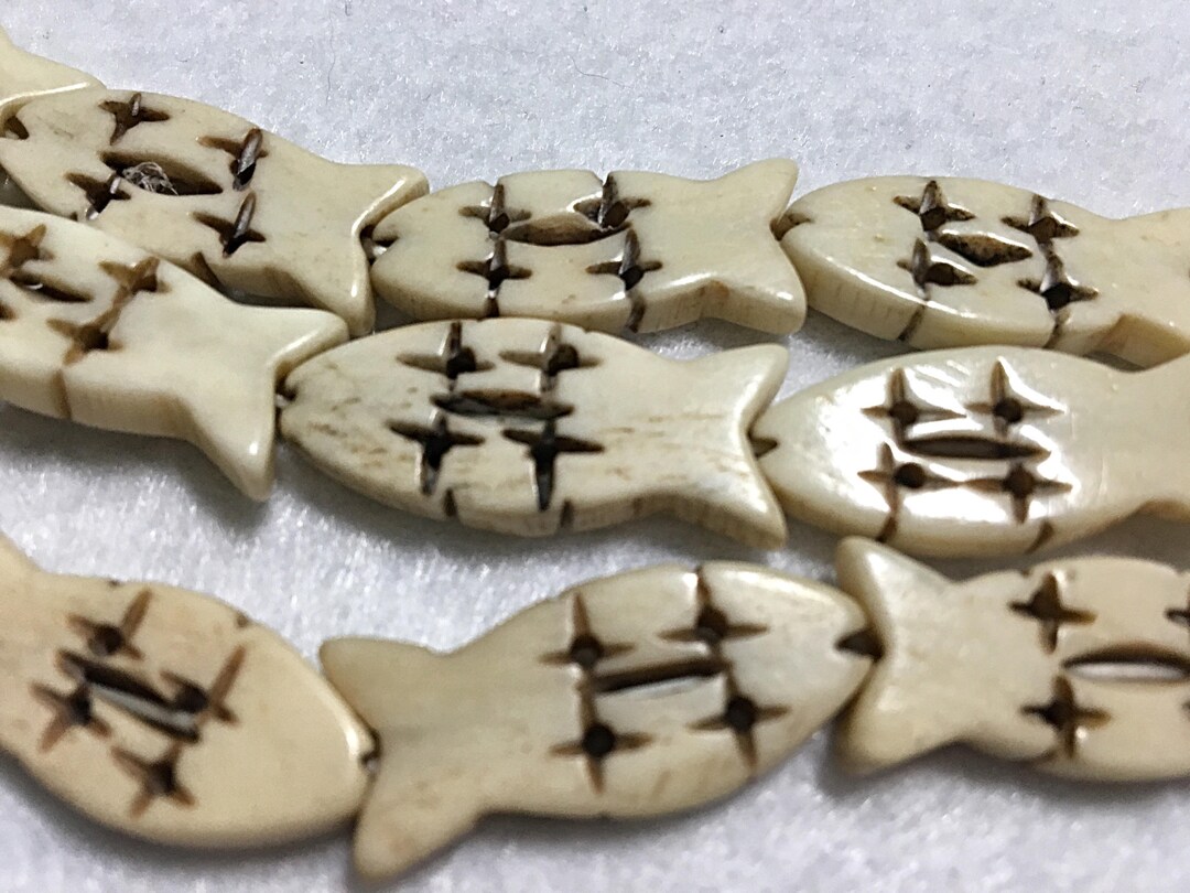 16" Strand of 1 Inch Antiqued Bone Fish, Approximately 16 Beads per ...