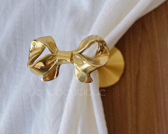 gold bow tie backs