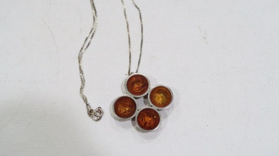 Unique sterling silver rhombus shaped amber pendant - Gem