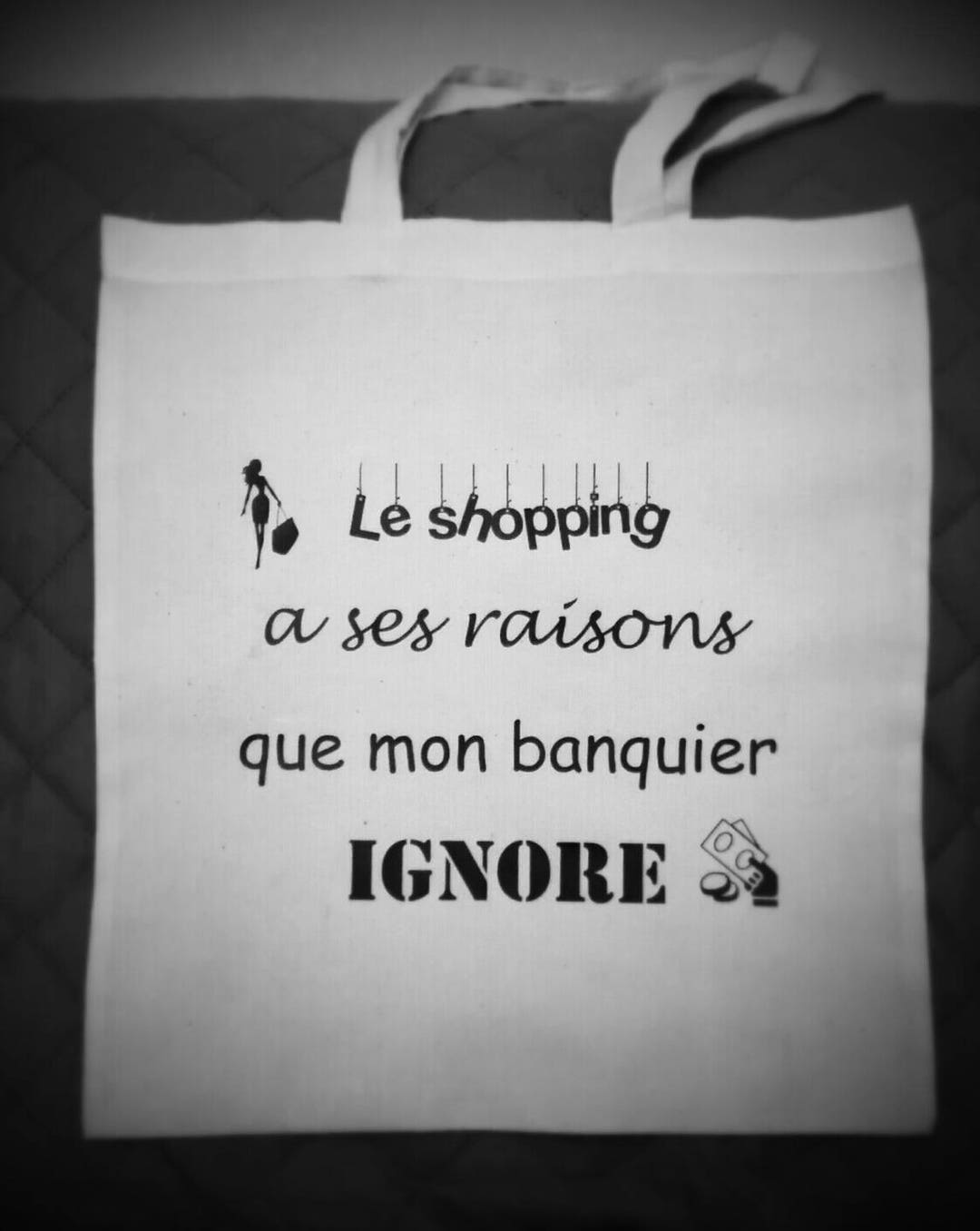 Sac humoristique "le shopping a ses raisons que mon banquier ignore ...