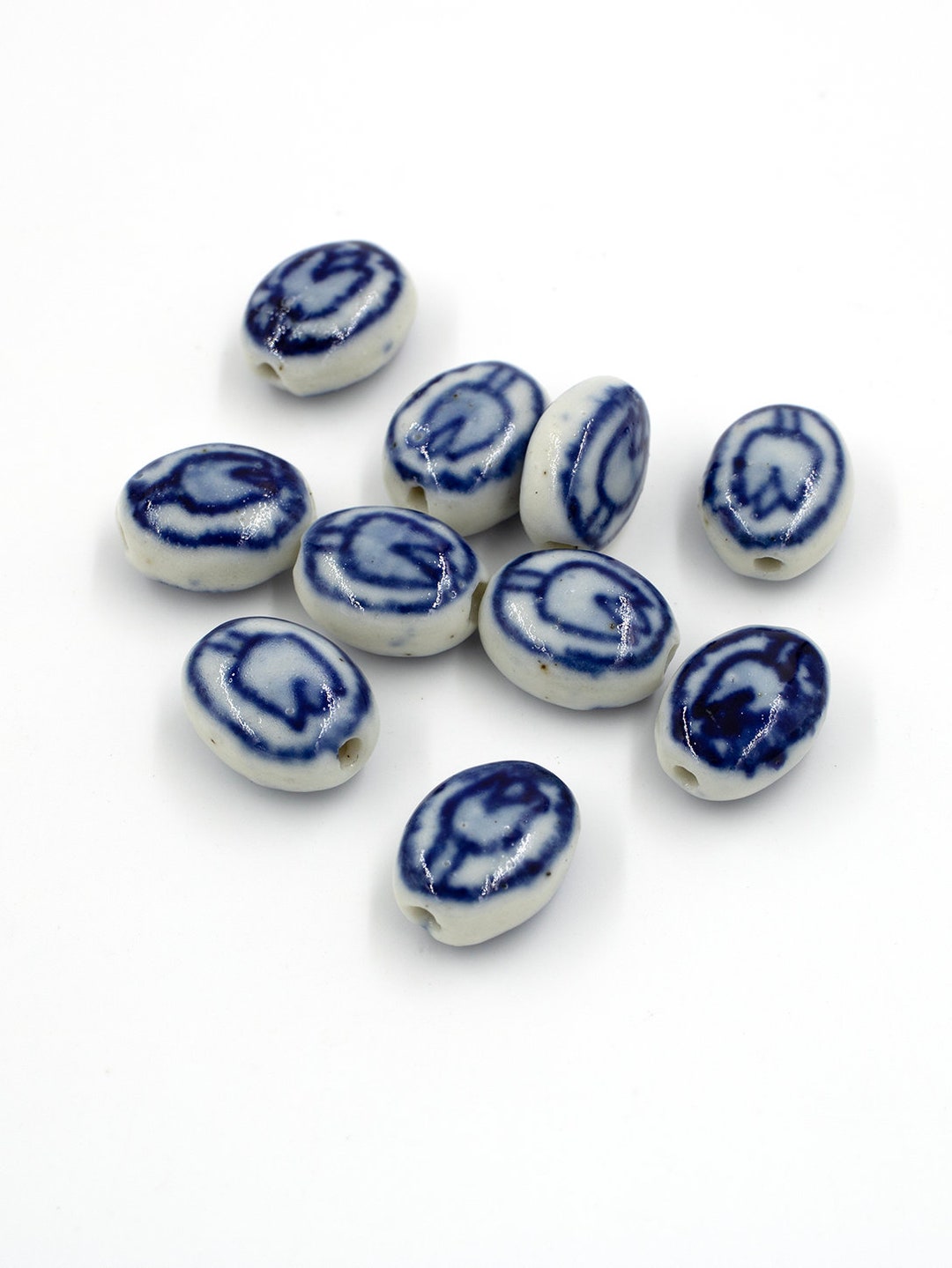2 X Oval Shaped Glazed Ceramic Beads With Painted Blue Floral Pattern ...