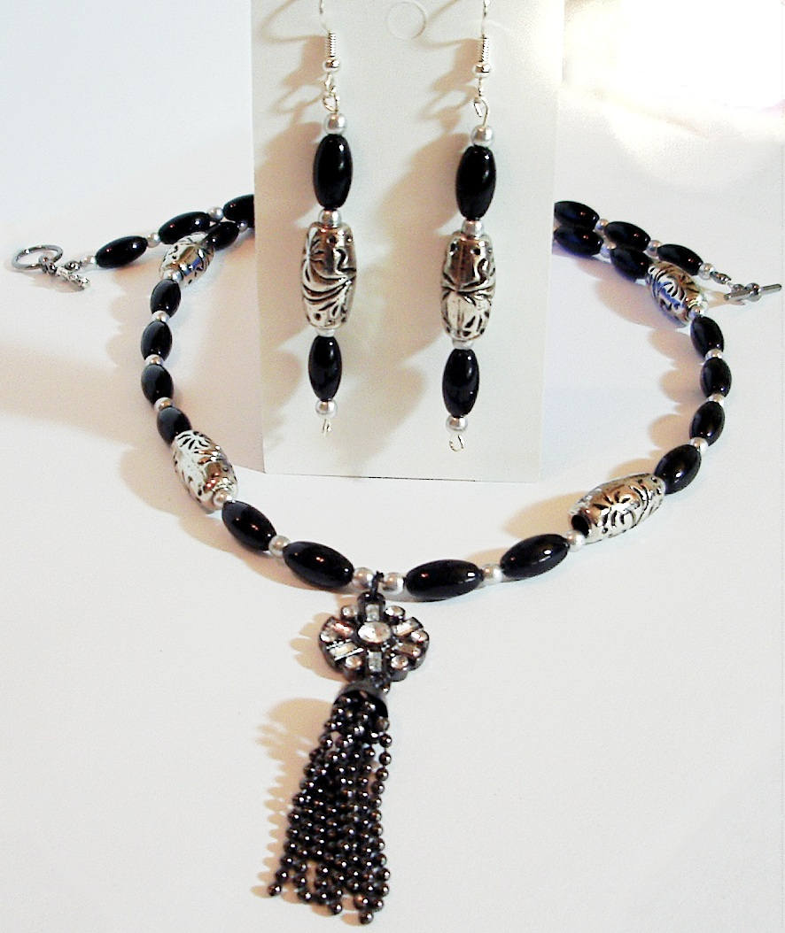 Black and silver beaded 23 necklace with metal tassle | Etsy
