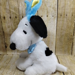 Peanuts Animated Snoopy Easter Bunny Ears Plays Theme Song Neck Swings ...