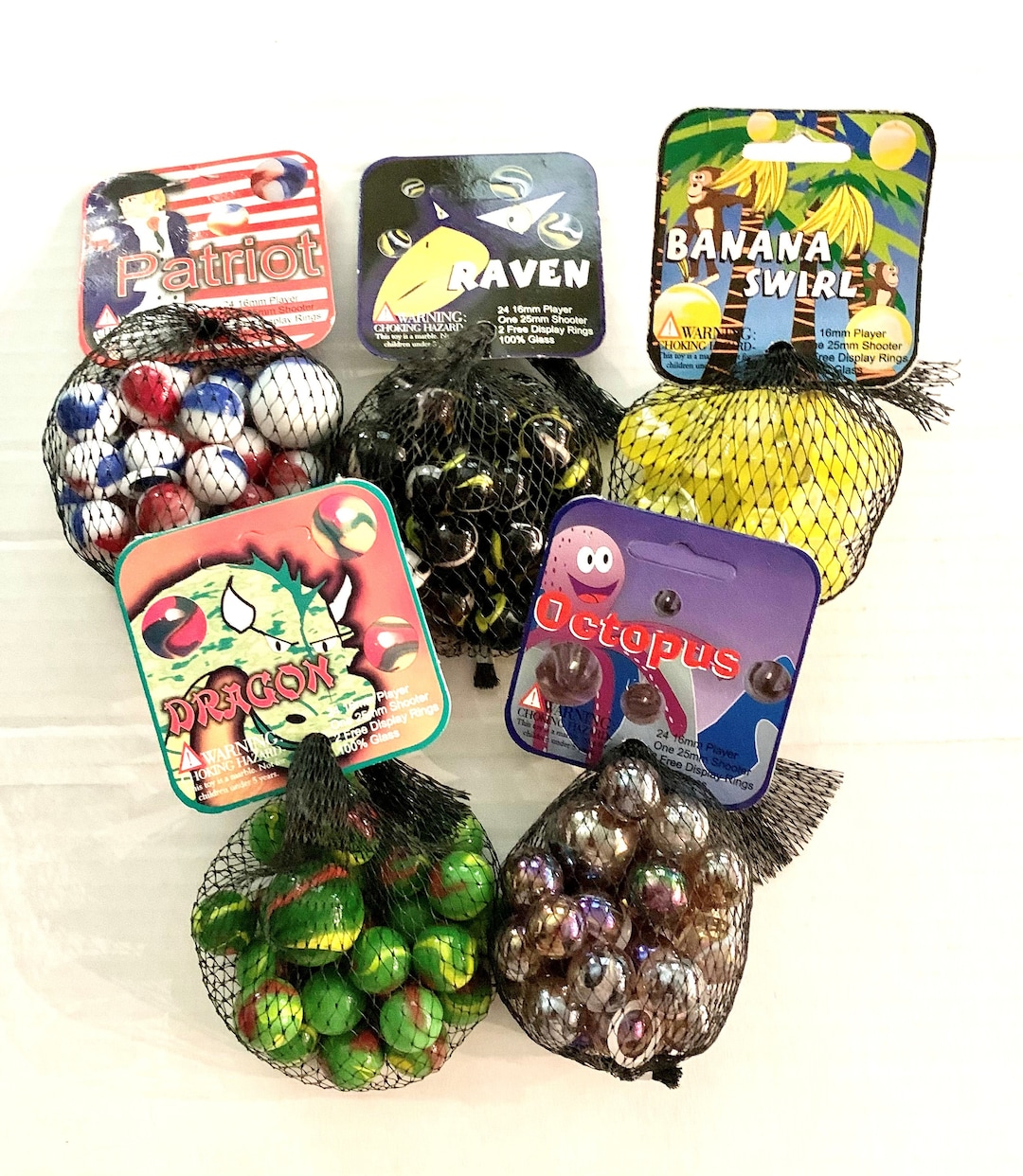 Lot of 5 Early Edition Mega Marbles Net Bags: Banana Swirl Raven ...