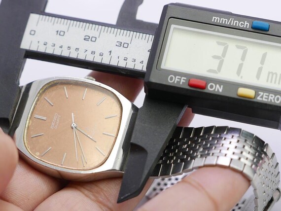 Vintage Seiko Emblem 4120 5000 Copper Dial Men Quart… - Gem