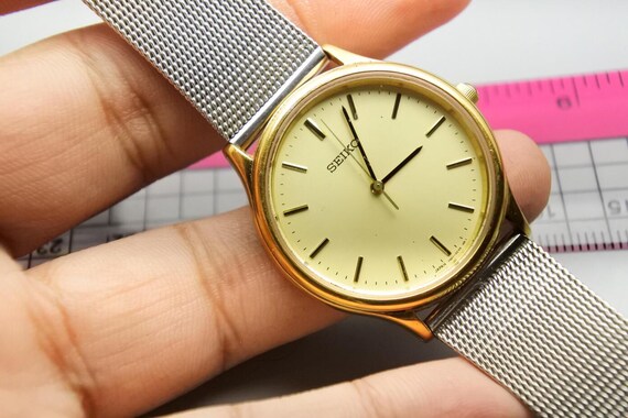 Vintage Seiko 7N01 0BD0 Golden Dial Men Quartz Watch … - Gem
