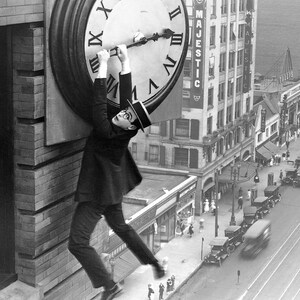 Harold Lloyd in Safety Last the Iconic Shot of Lloyd Hanging From the ...
